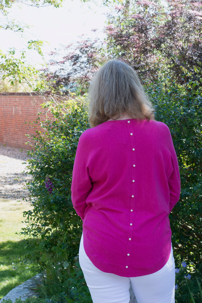 JUMPER WITH PEARL BUTTON BACK DETAIL, CURVED HEMLINE AND ROUNDED NECKL ...